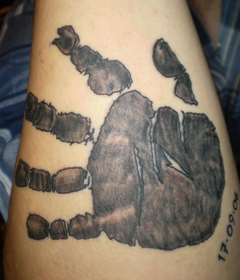 Kid Ink Hand Tattoos